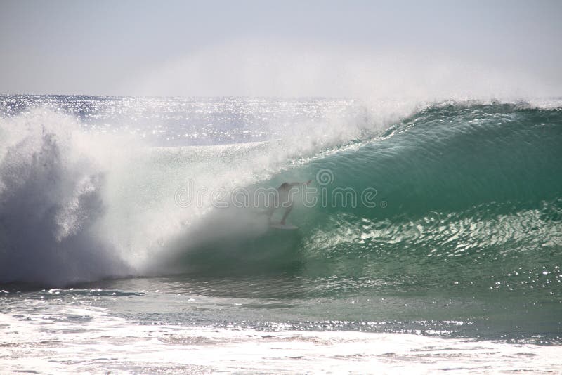 Surfer in the Tube Riding a Big Wave Stock Image - Image of athlete ...