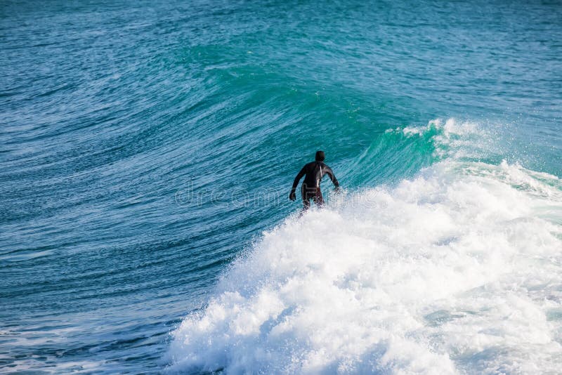 Surfer and Turquoise Barrel in Ocean Stock Photo - Image of ride, blue ...