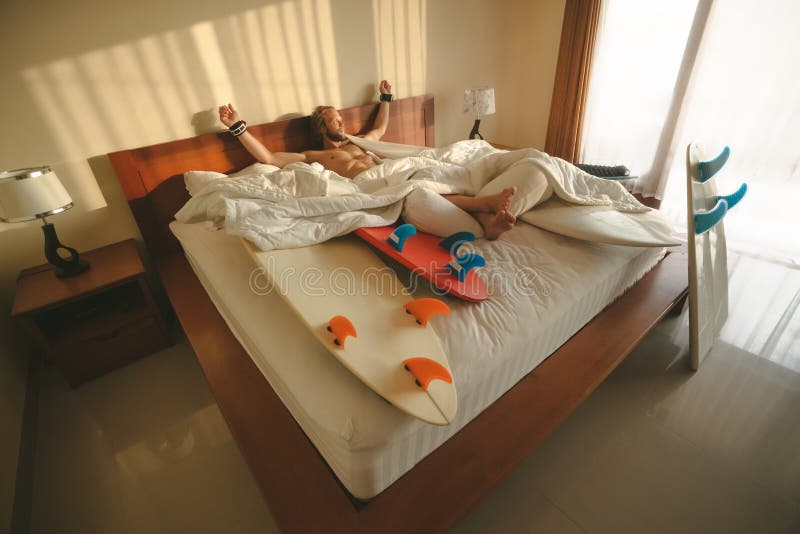 Surfer wakes up stock image. Image of bedroom, lifestyle - 81880371