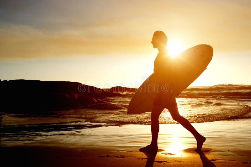 Surfer Walking on Beach with Surfboard during Sunset Stock Image ...