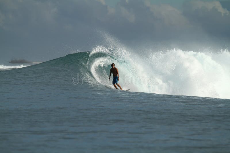 Surfer Riding in Barrel on Perfect Wave Stock Photo - Image of barrel ...
