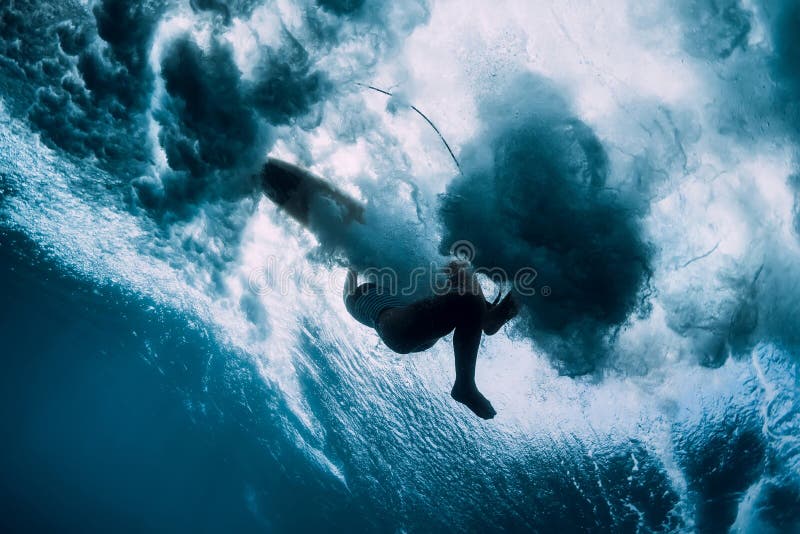 Surfer Woman with Surfboard with Under Ocean Wave. Underwater Stock ...