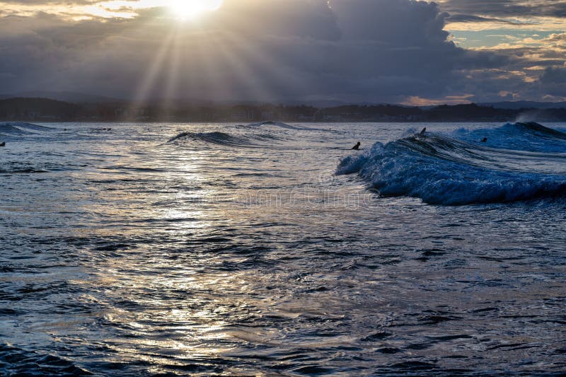 Surfers Sunset Dramatic Clouds Sun Rays Stock Photos - Free & Royalty ...