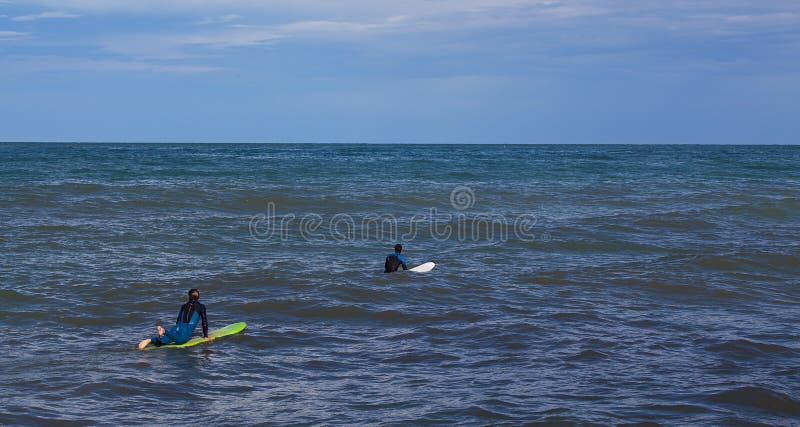 Surfers Waiting for the Wave. Stock Photo - Image of surfer, wave: 94433476