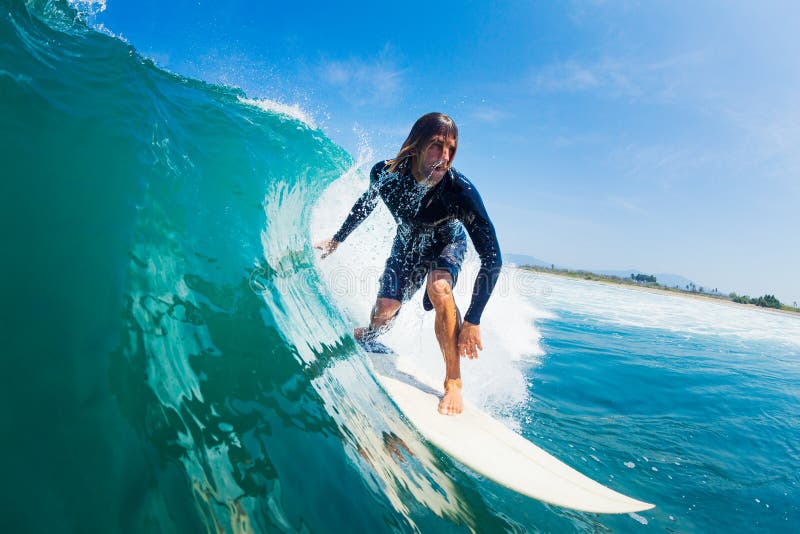 Surfer on Blue Ocean Wave stock photo. Image of action - 22447432