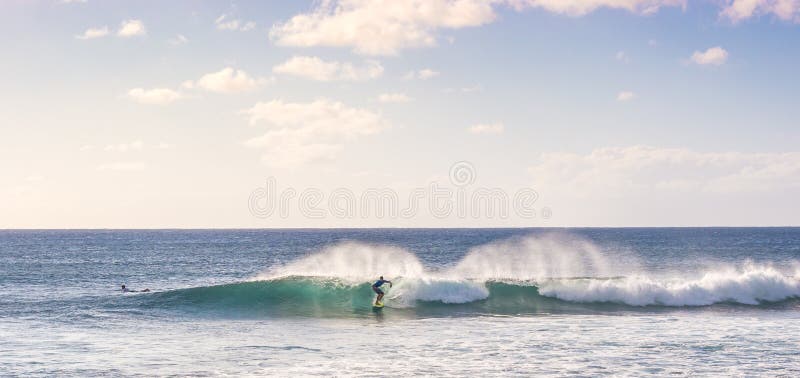 Surfing at Easter Island in Front of Hanga Roa Stock Photo - Image of ...