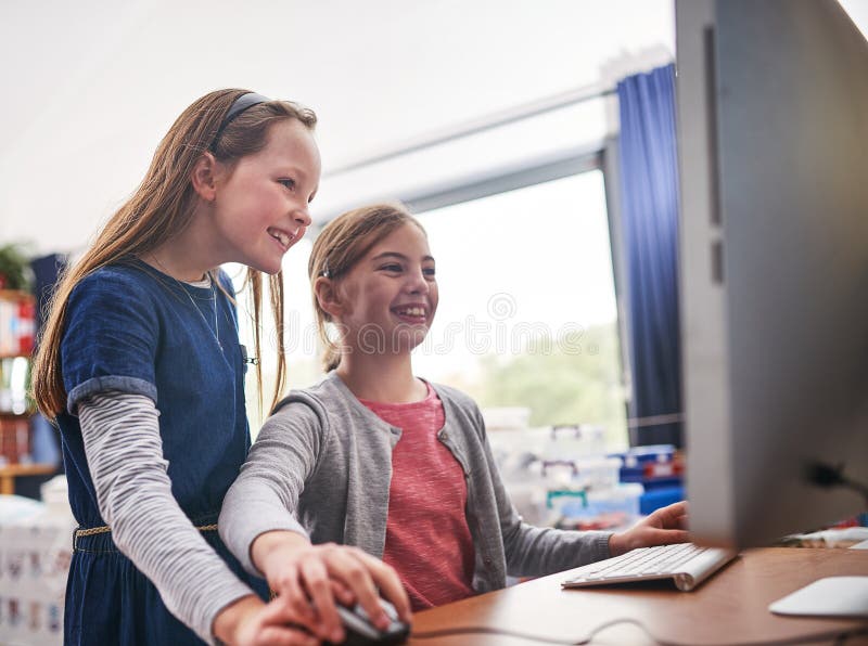 Surfing the Internet with My Bestie. Elementary School Children in ...