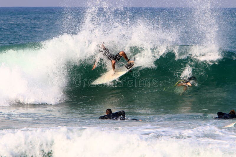 Surfing - Riding a Wave on Light Boards. Editorial Stock Photo - Image ...