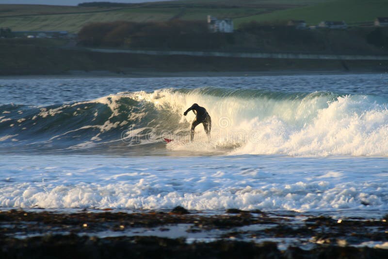 Surfing at sunset stock image. Image of wave, roller, extreme - 4088049