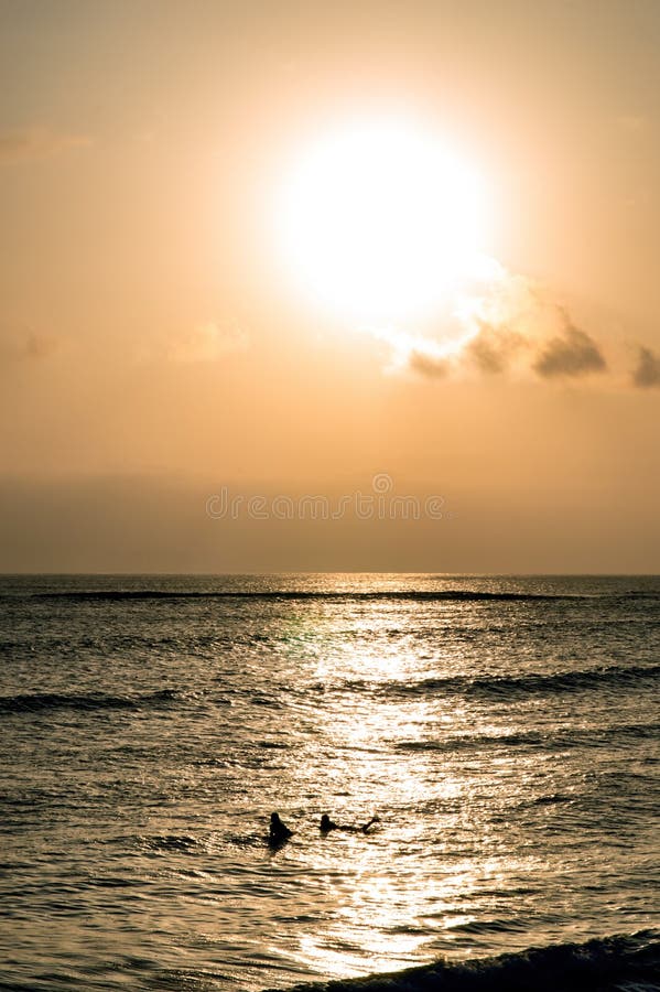 Surfing at Sunset stock photo. Image of surf, coast, ocean - 53823560