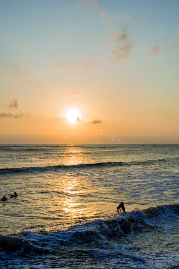 Surfing at Sunset stock image. Image of action, silhouette - 53823783