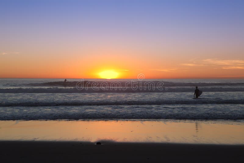 Surfing on sunset editorial photo. Image of pacific, scpectacular ...