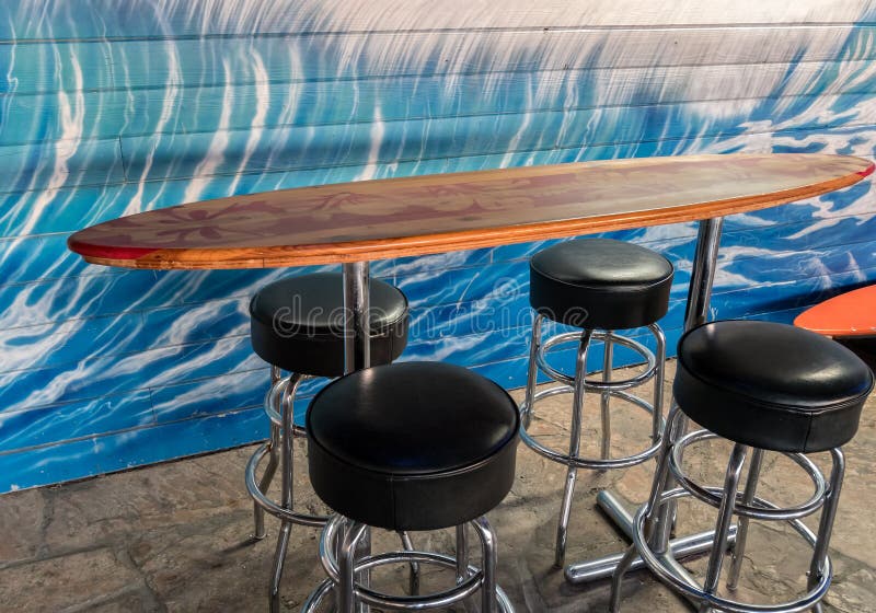 Surf board bar and stools stock image. Image of board - 133396227