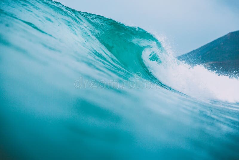 Blue Surfing Wave Breaks in the Ocean Stock Photo - Image of barrel ...