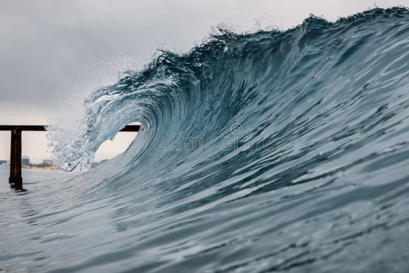 Surfing Wave in Pacific Ocean. Ideal Waves and Pier Stock Photo - Image ...