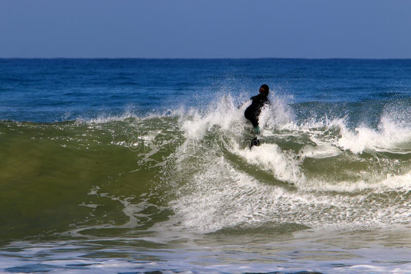 Surfing - Wave Riding in the Mediterranean Stock Image - Image of board ...