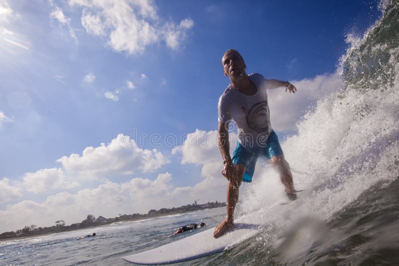 Surfing a wave stock image. Image of hobby, sports, balance - 32373703