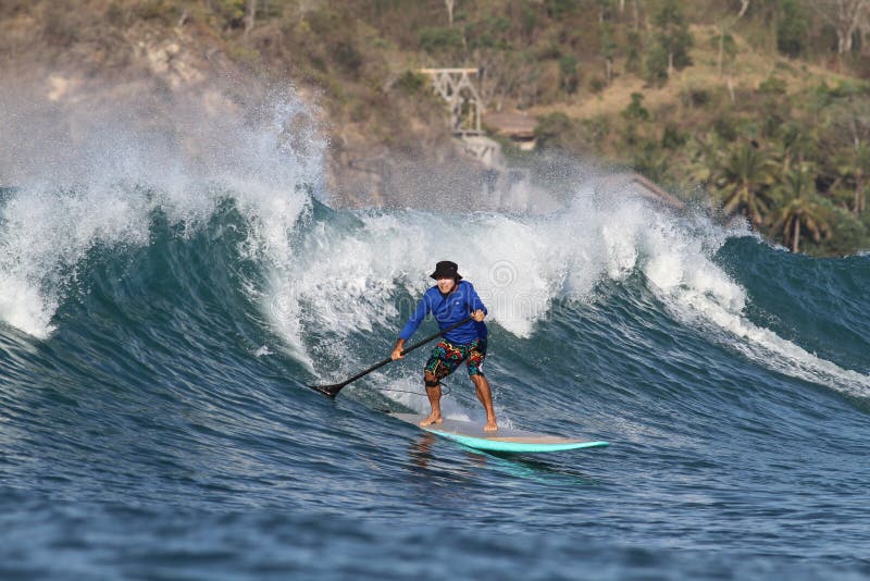 Surfing the Waves editorial photography. Image of exercise - 32830732
