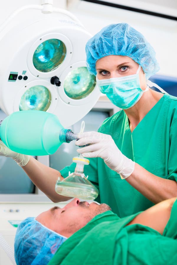 Surgeon in Operating Room with Anesthetic Mask Stock Photo - Image of ...
