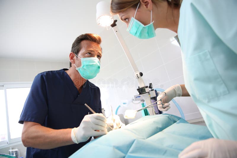 Surgeon with Assistant in Operating Block Stock Image - Image of ...