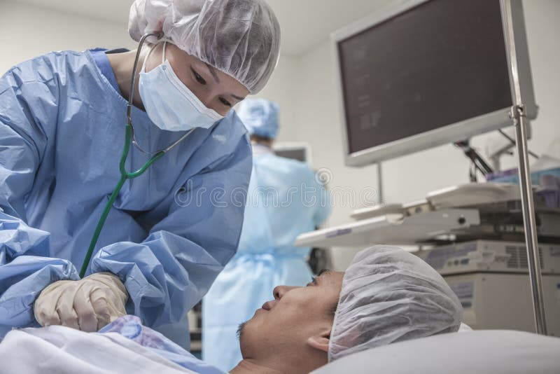 Surgeon Consulting a Patient, Getting Ready for Surgery Stock Image ...