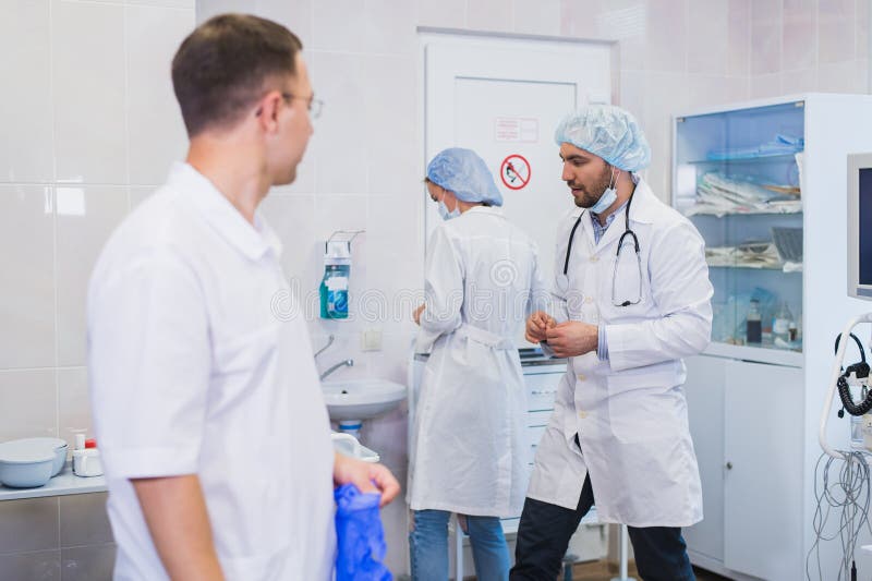 Surgeon Gathered with His Team of Doctors before Surgery Stock Photo ...