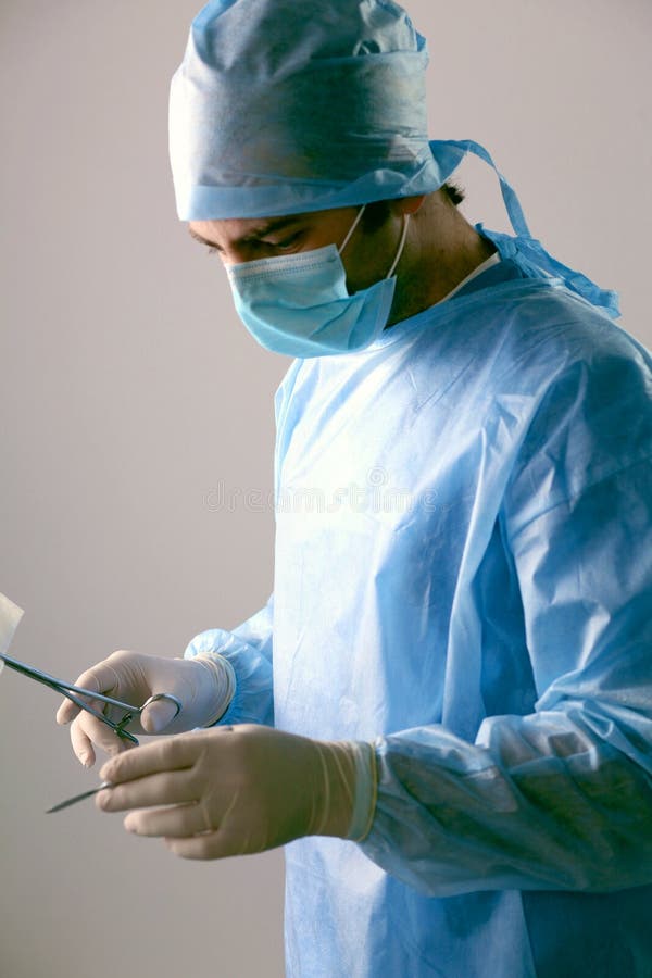 Surgeon Getting Ready To Operate Stock Photo - Image of operating, copy ...