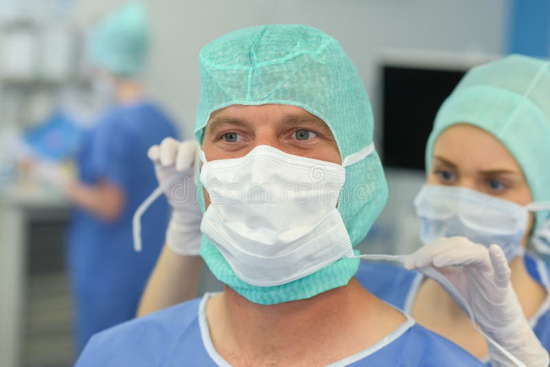Surgeon Getting Ready To Operate Stock Image - Image of room, assistant ...
