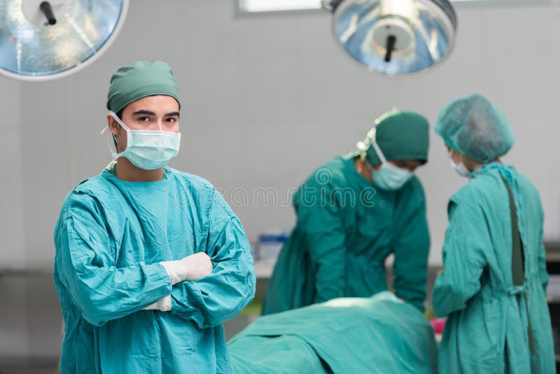 Portrait Of Nurse Working In Operating Theatre Stock Photo - Image of ...