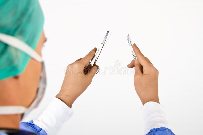Surgeon Holding Scalpel and Scissors in Hand Stock Photo - Image of ...