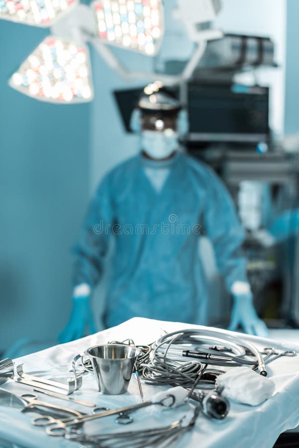 Surgeon Looking at Camera in Operating Room with Tools Stock Image ...