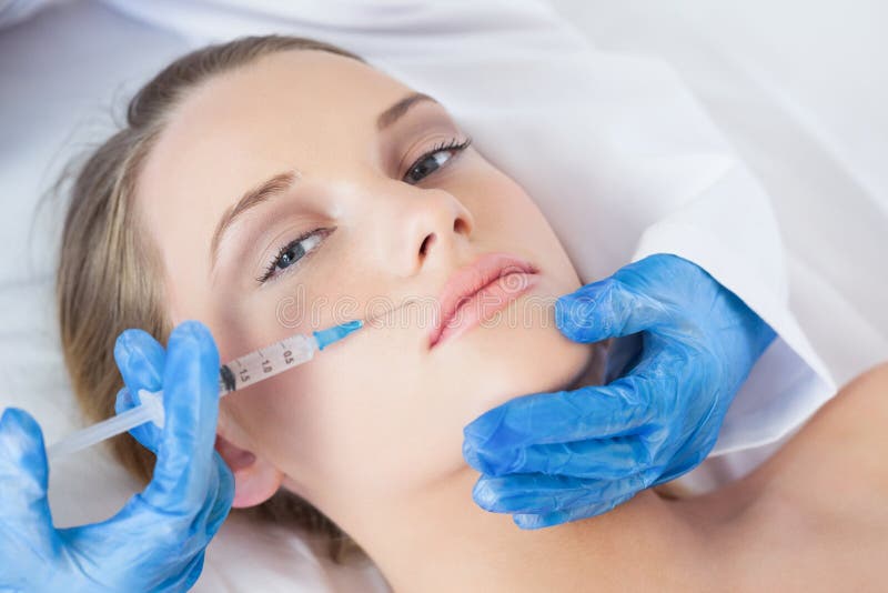 Surgeon Making Injection Above Lips on Cute Woman Lying Stock Photo ...