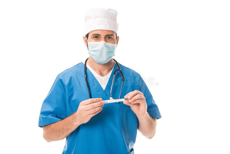 Surgeon in Medical Mask Holding Thermometer and Looking at Camera Stock ...