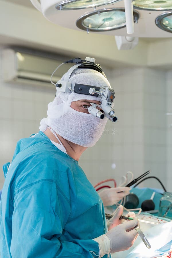 The Surgeon in the Operating Room Stock Photo - Image of surgeon, room ...
