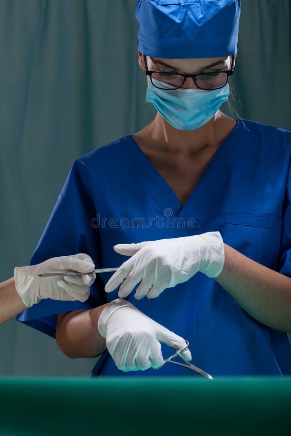 Surgeon at operating room stock photo. Image of professional - 46112196