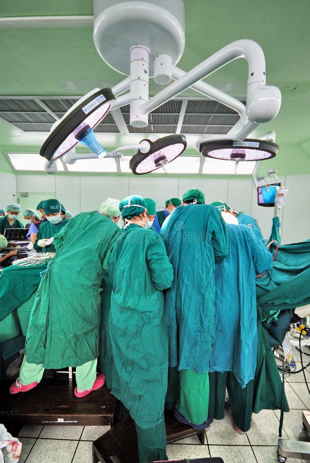 Surgeon in operative field editorial stock photo. Image of light - 97445768