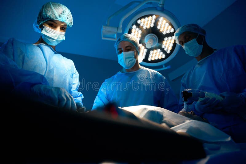 Surgeon Performing Operation in Modern Operating Room Stock Image ...