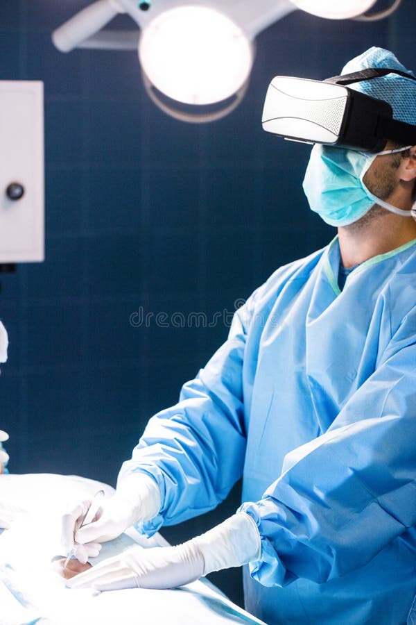 Surgeon Performing Operation in Operation Room Stock Image - Image of ...