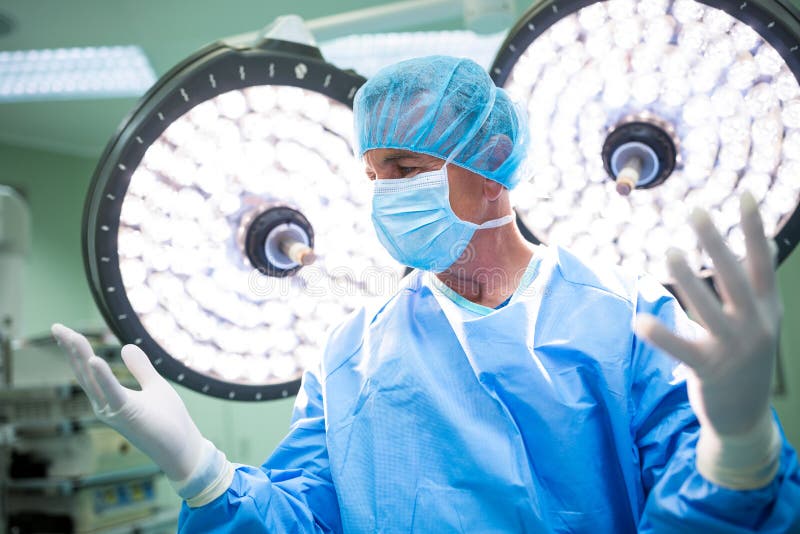 Surgeon Preparing for Operation in Operation Room Stock Photo - Image ...