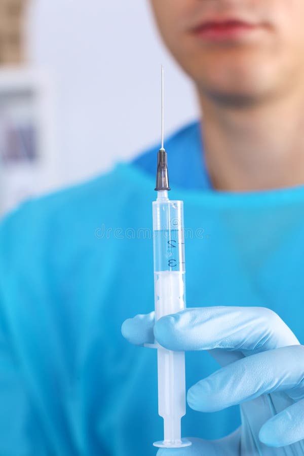 The Surgeon with a Syringe in the Hands Stock Image - Image of help ...