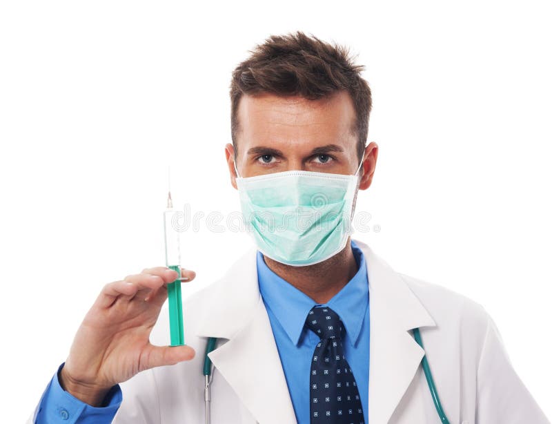 Surgeon with syringe stock image. Image of hypodermic - 33617247