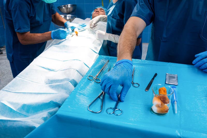 Surgeon Taking a Scissors from Tray Stock Image - Image of surgeon ...
