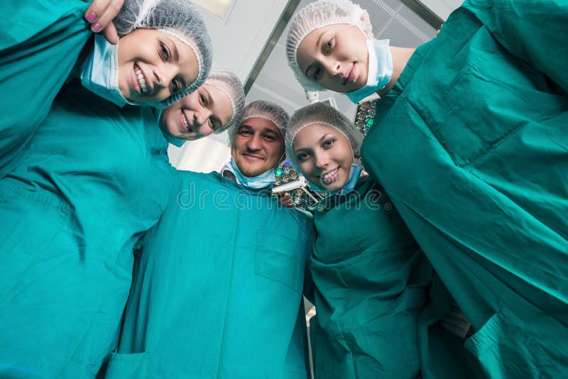 Surgeon Team Working Together in a Surgical Room Stock Image - Image of ...