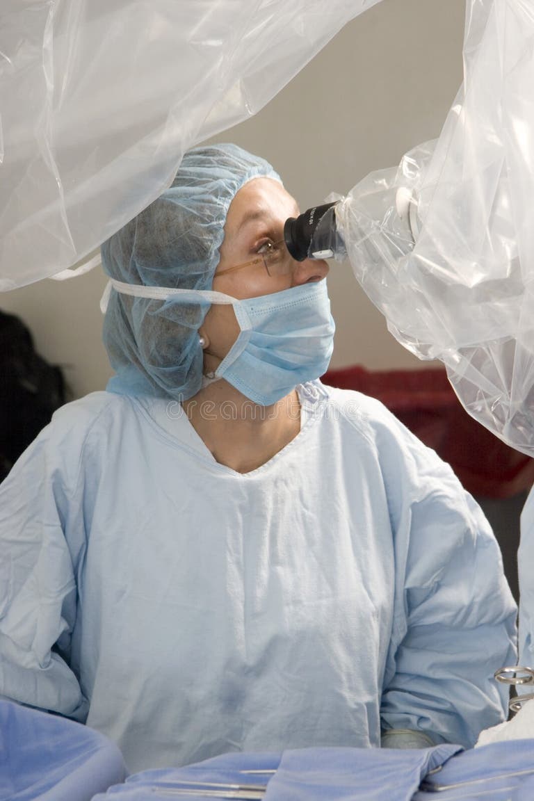 Female Surgeon Using Operating Microscope Stock Photos - Free & Royalty ...