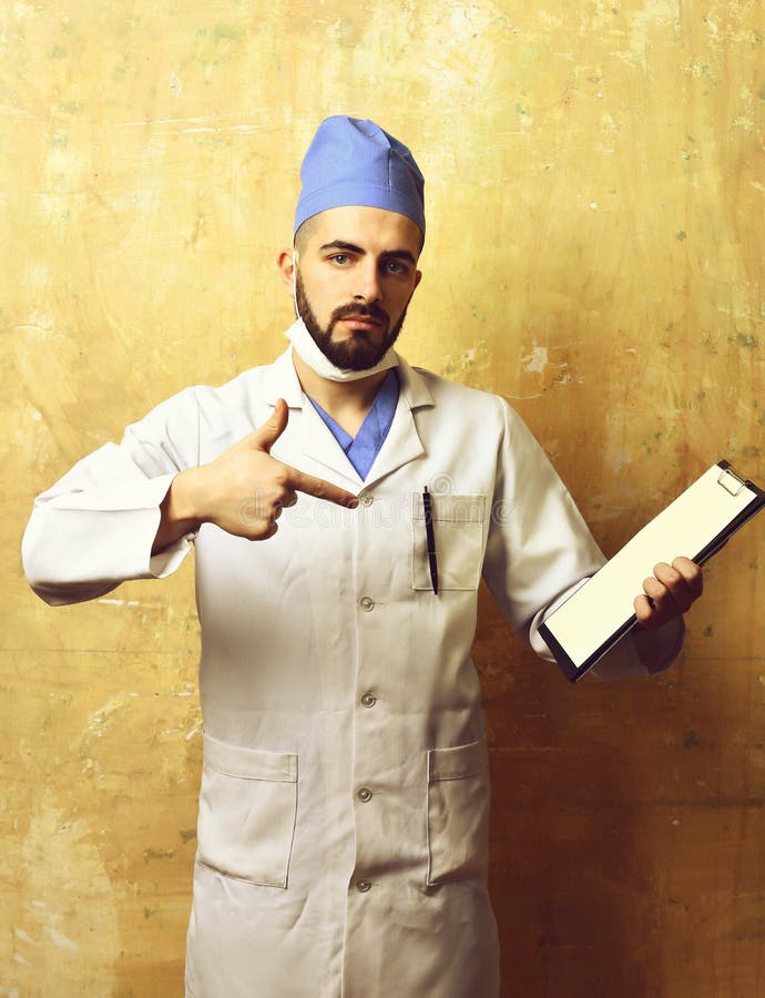 Surgeon in White Coat Pointing at Clip Folder Stock Photo - Image of ...