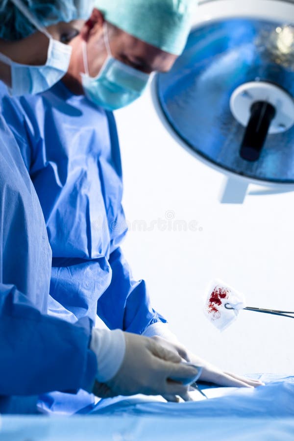 Surgeon at Work stock image. Image of real, blood, surgical - 18267213