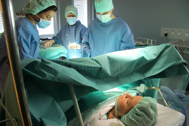 Surgeons with C Arm in Operating Room Stock Photo - Image of intensice ...