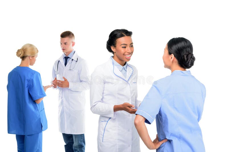 Multiethnic Surgeons and Doctors Talking Stock Photo - Image of ...