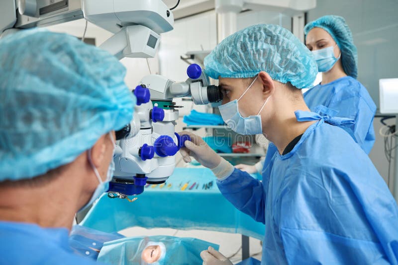 Surgeons Doing a Laser Vision Correction Operation Stock Image - Image ...