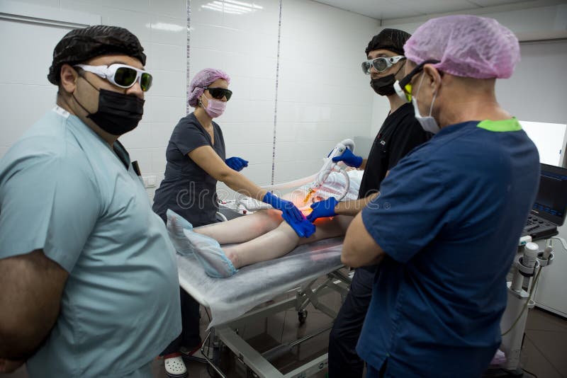 Surgeons Surgeons Doing Leg Surgery Stock Photo - Image of carotid ...